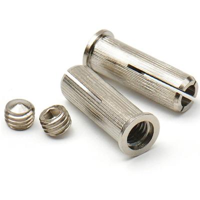 PAIRE INSERTS 8mm AVEC VIS D'EXTENSION DANS LE BOIS